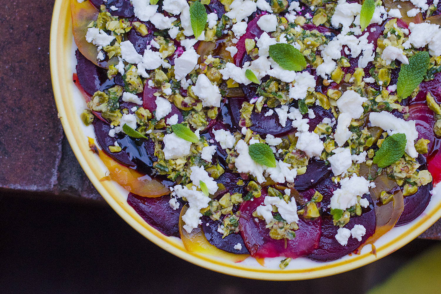 Colorful Beetroot carpaccio with a mint pistachio vinaigrette and goat ...